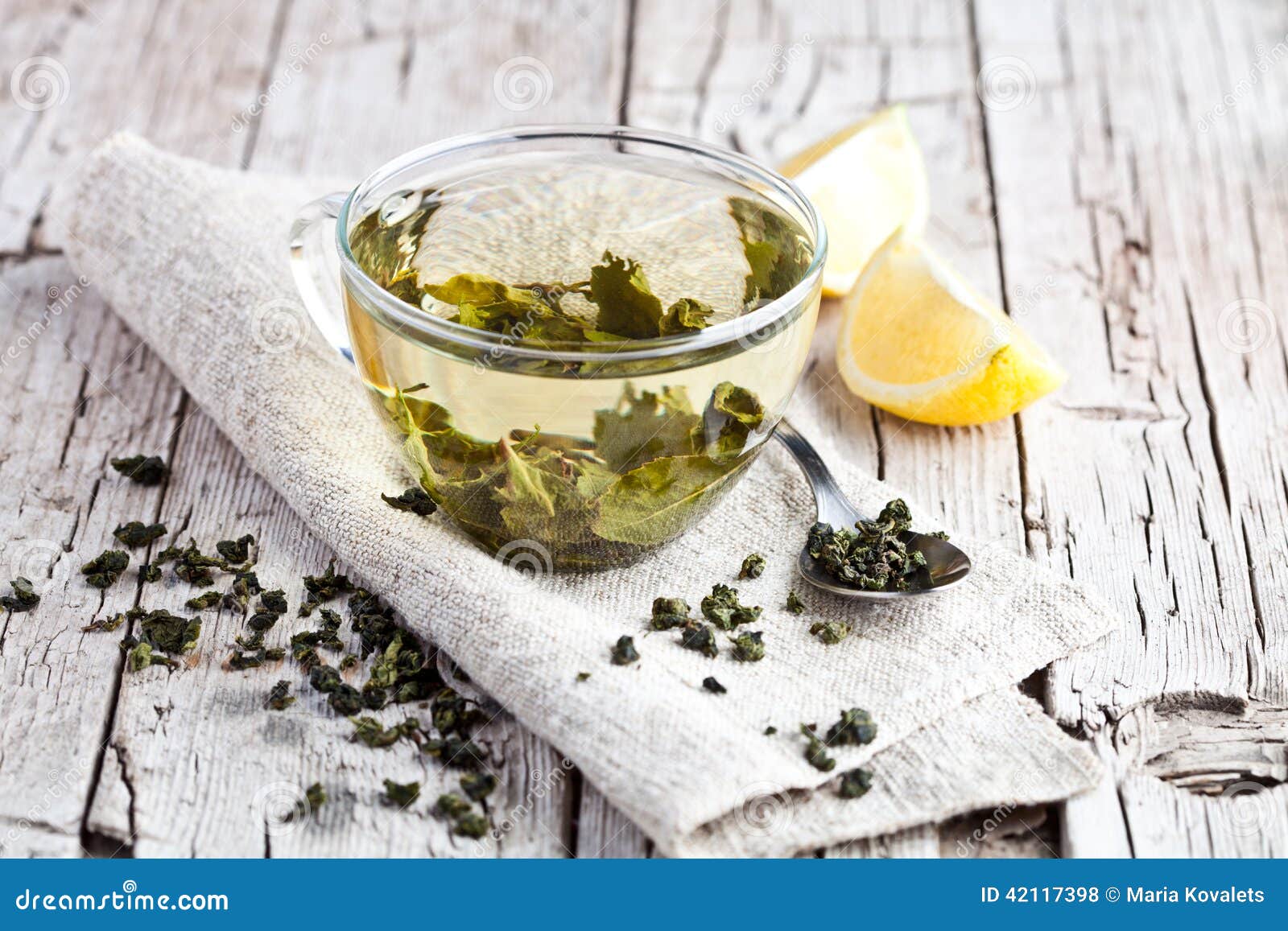 Cup of green tea and lemon stock photo. Image of health - 42117398