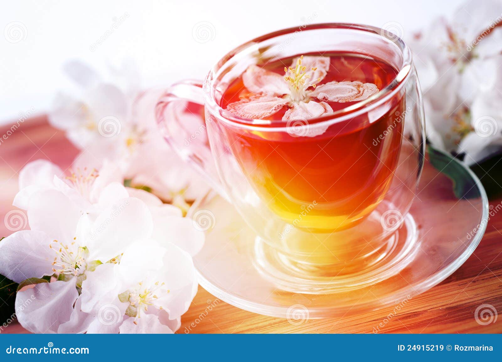 Cup of Herbal Tea with Apple Flowers on a Wooden Stock Image - Image of ...