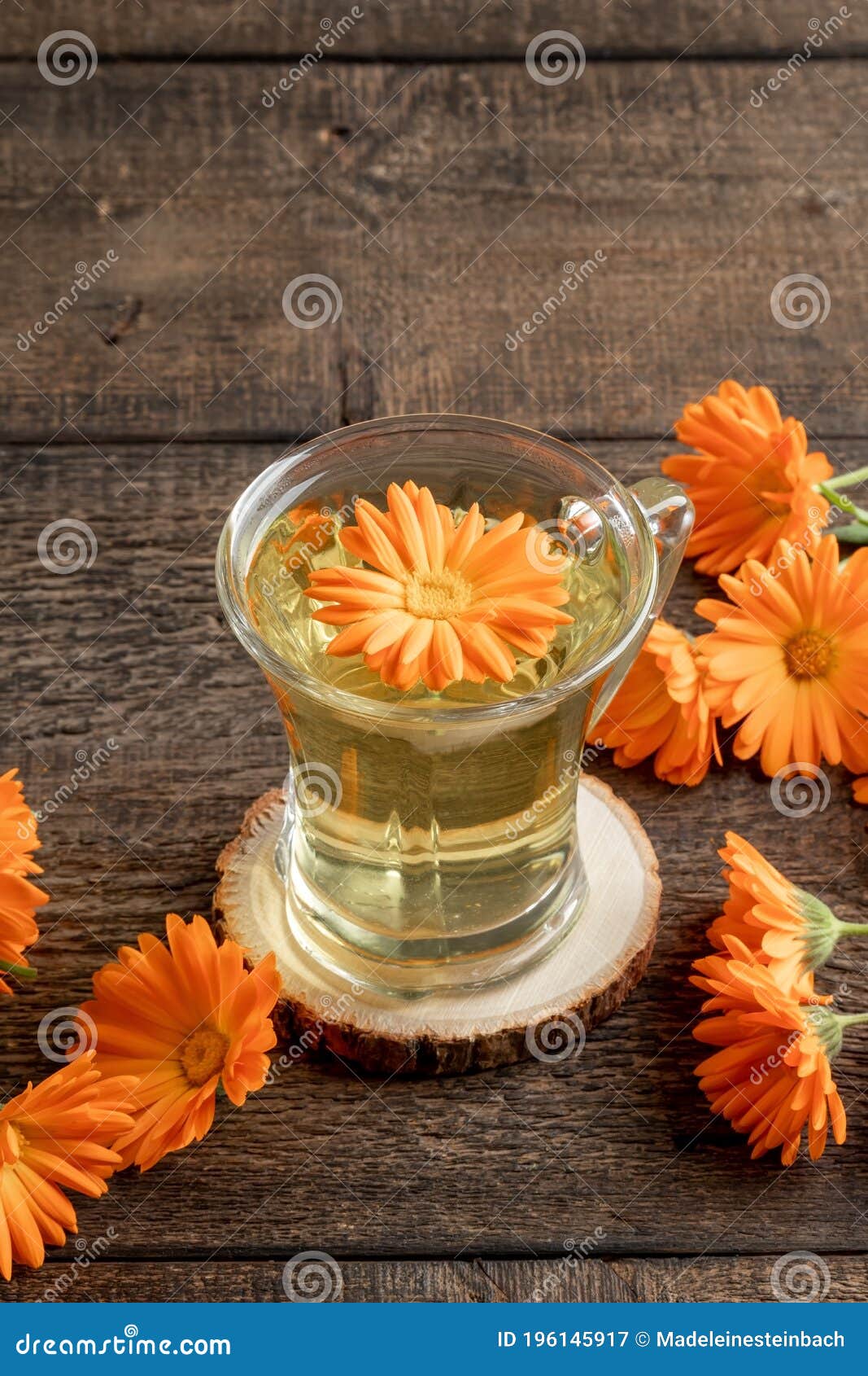 A Cup of Herbal Tea with Fresh Calendula Flowers Stock Image - Image of ...