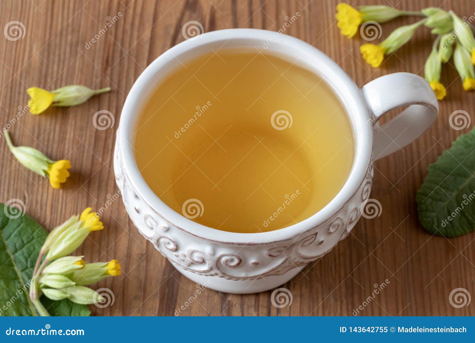 A Cup of Herbal Tea with Fresh Primula Flowers Stock Image - Image of ...