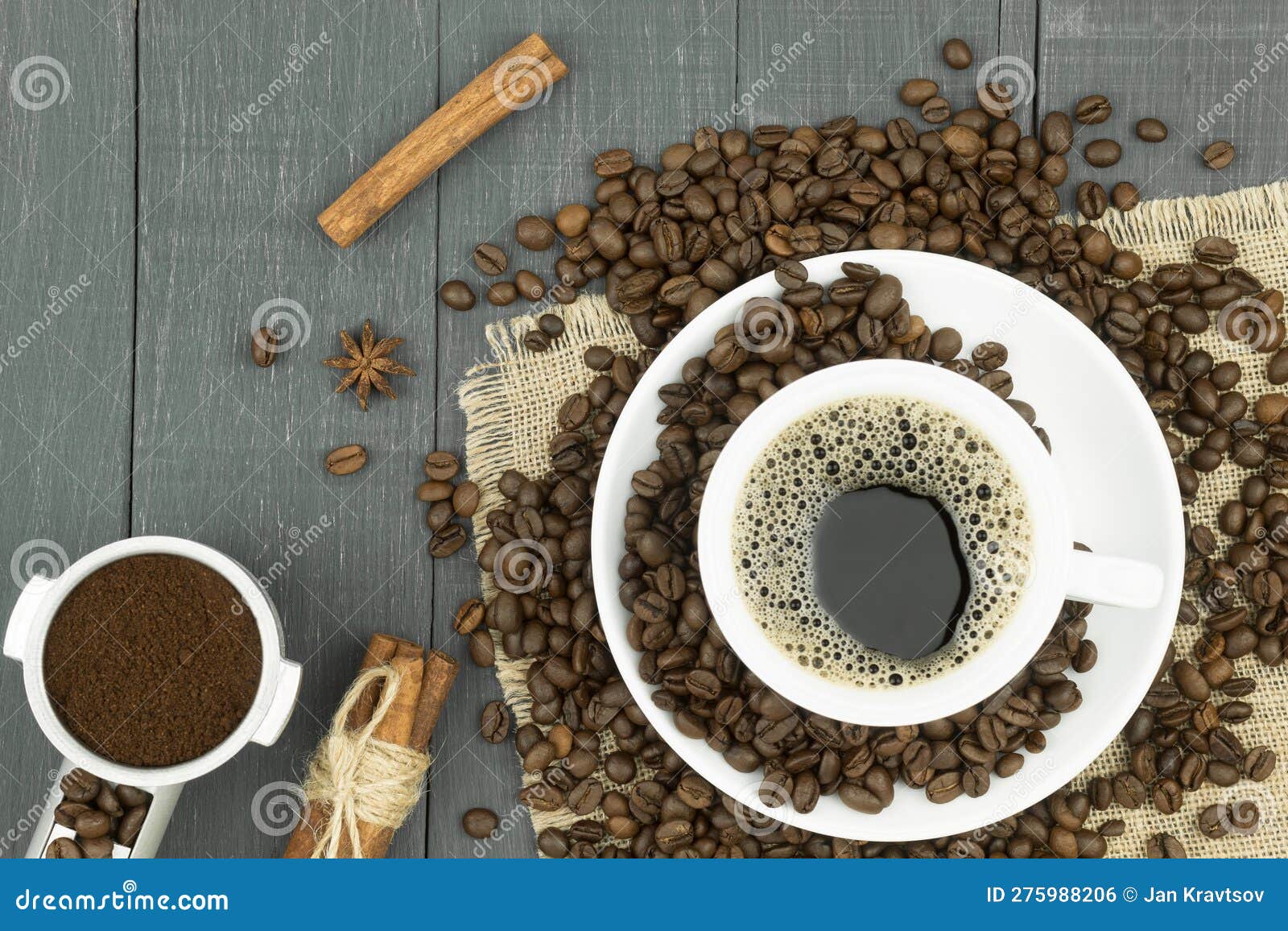 Cup with Hot Coffee on the Background of Grains and Ground Coffee Stock ...