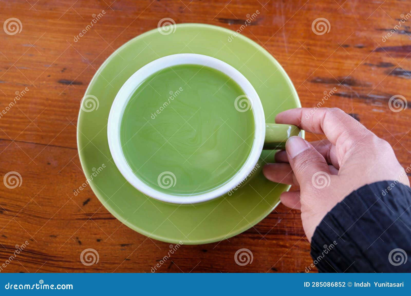 Cup of Hot Milk Green Tea in Hand Stock Photo - Image of elements, herb ...
