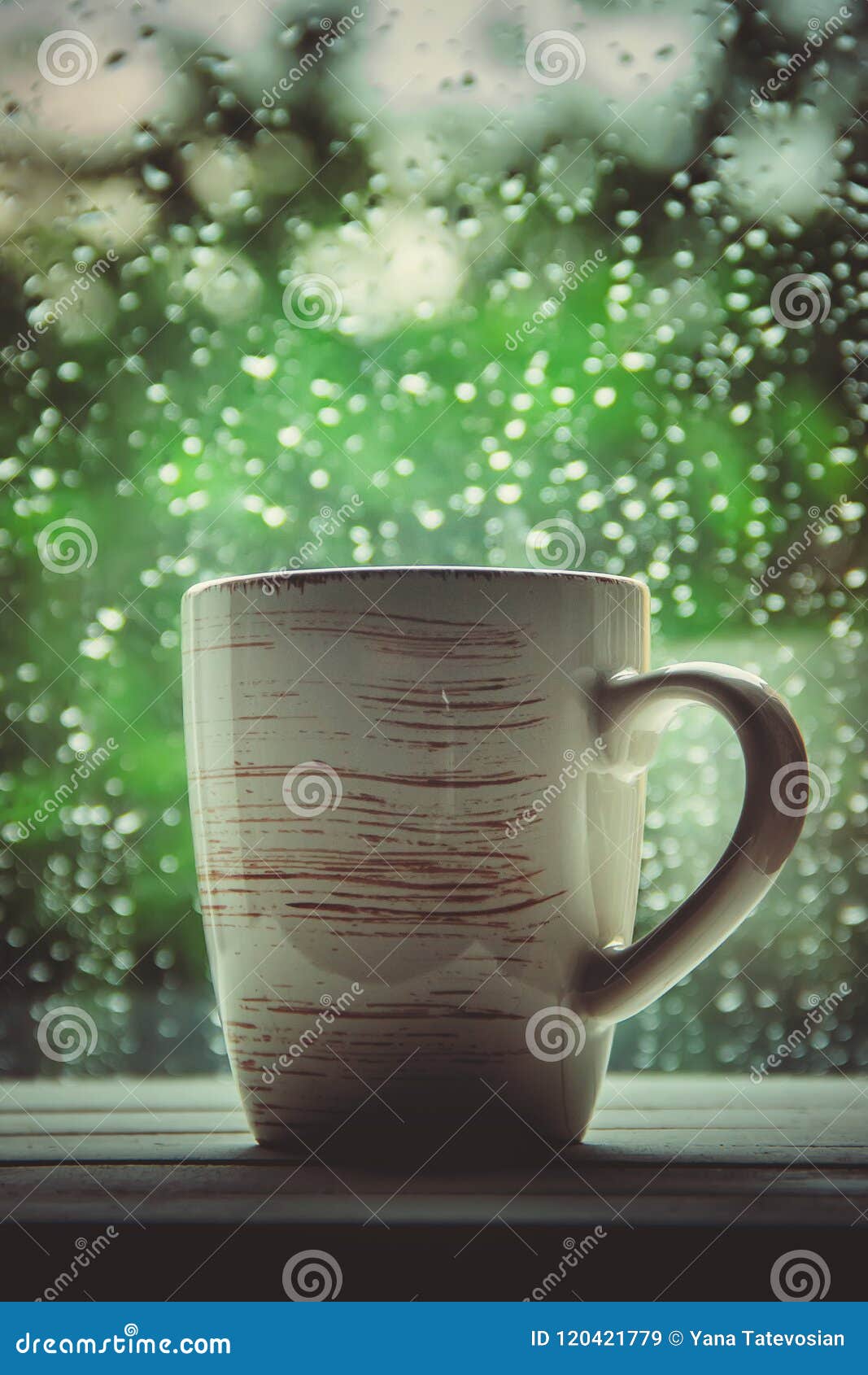 A Cup of Hot Tea in the Background Rain Outside the Window. Stock Image ...