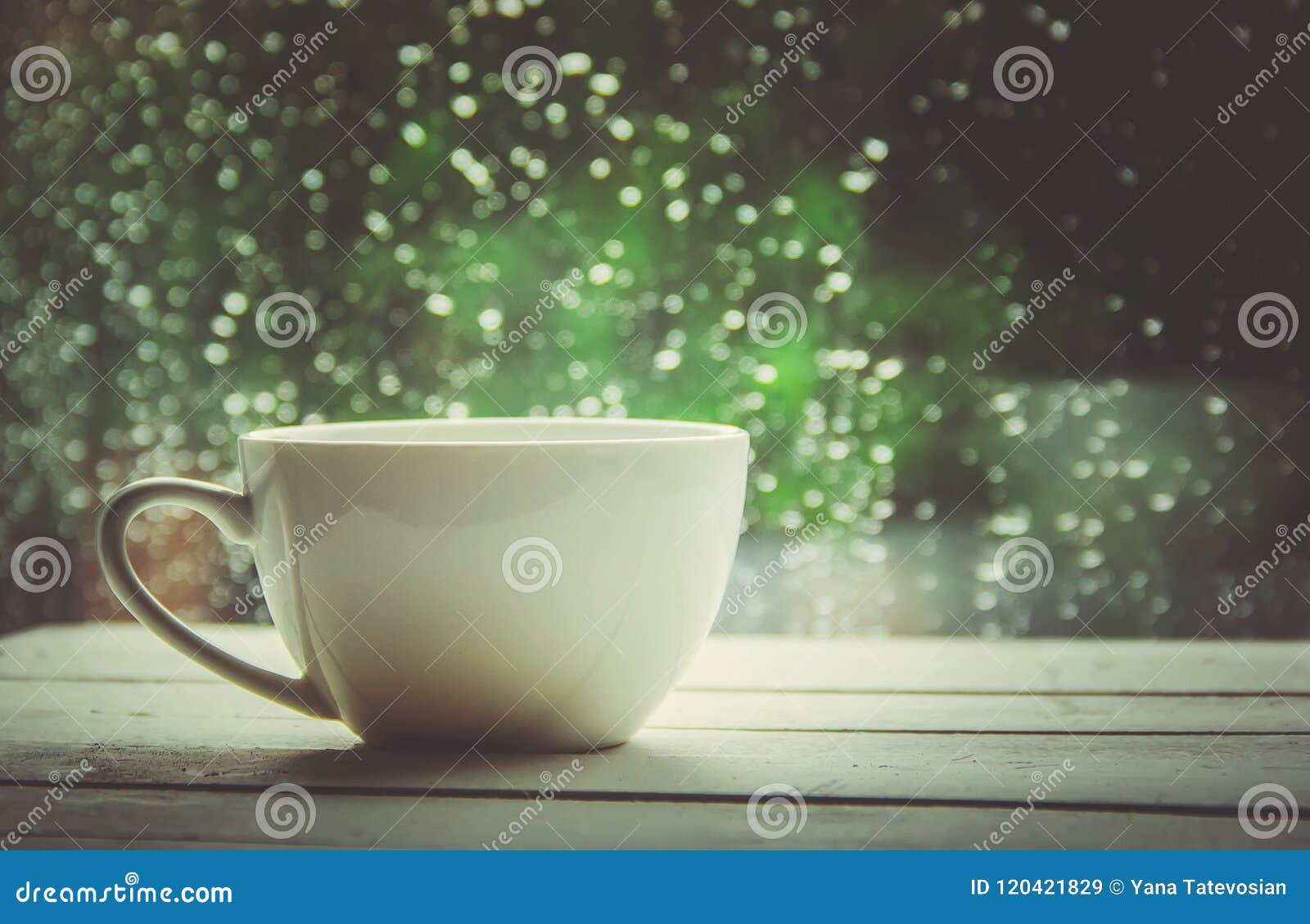 A Cup of Hot Tea in the Background Rain Outside the Window. Stock Image ...