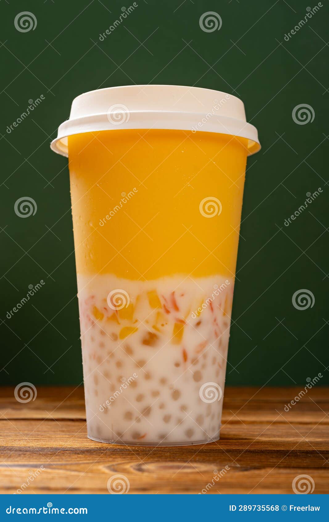 A Cup of Mango Pomelo Sago Dessert Vertical Composition Stock Photo ...