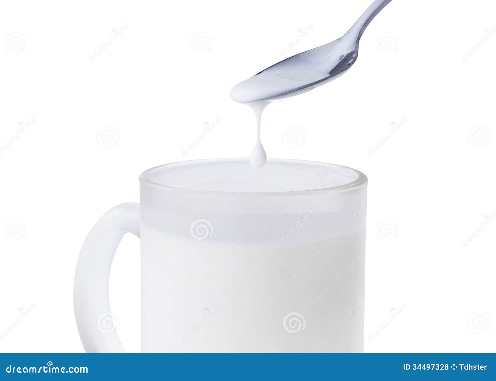 Cup of milk with spoon stock photo. Image of full, cooking - 34497328