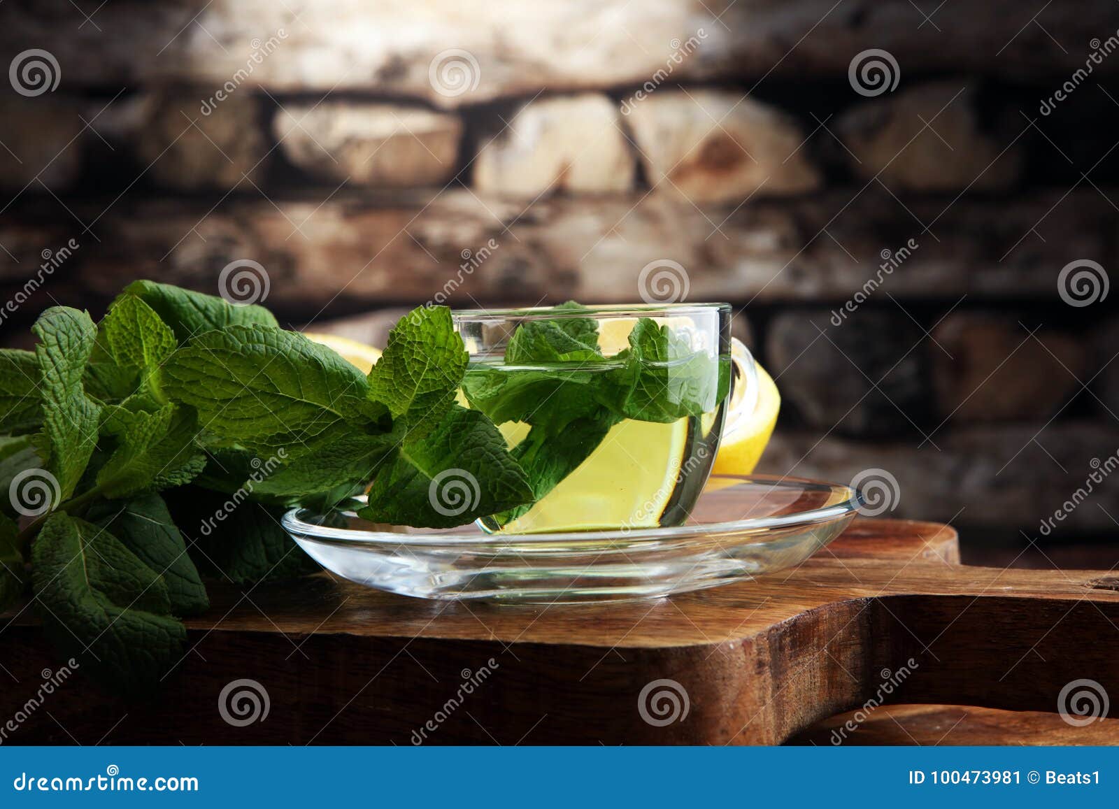 Cup of Mint Tea and Leaves of Mint on the Table Stock Image - Image of ...