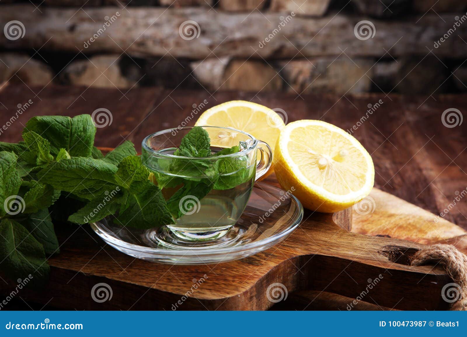 Cup of Mint Tea and Leaves of Mint on the Table Stock Image - Image of ...