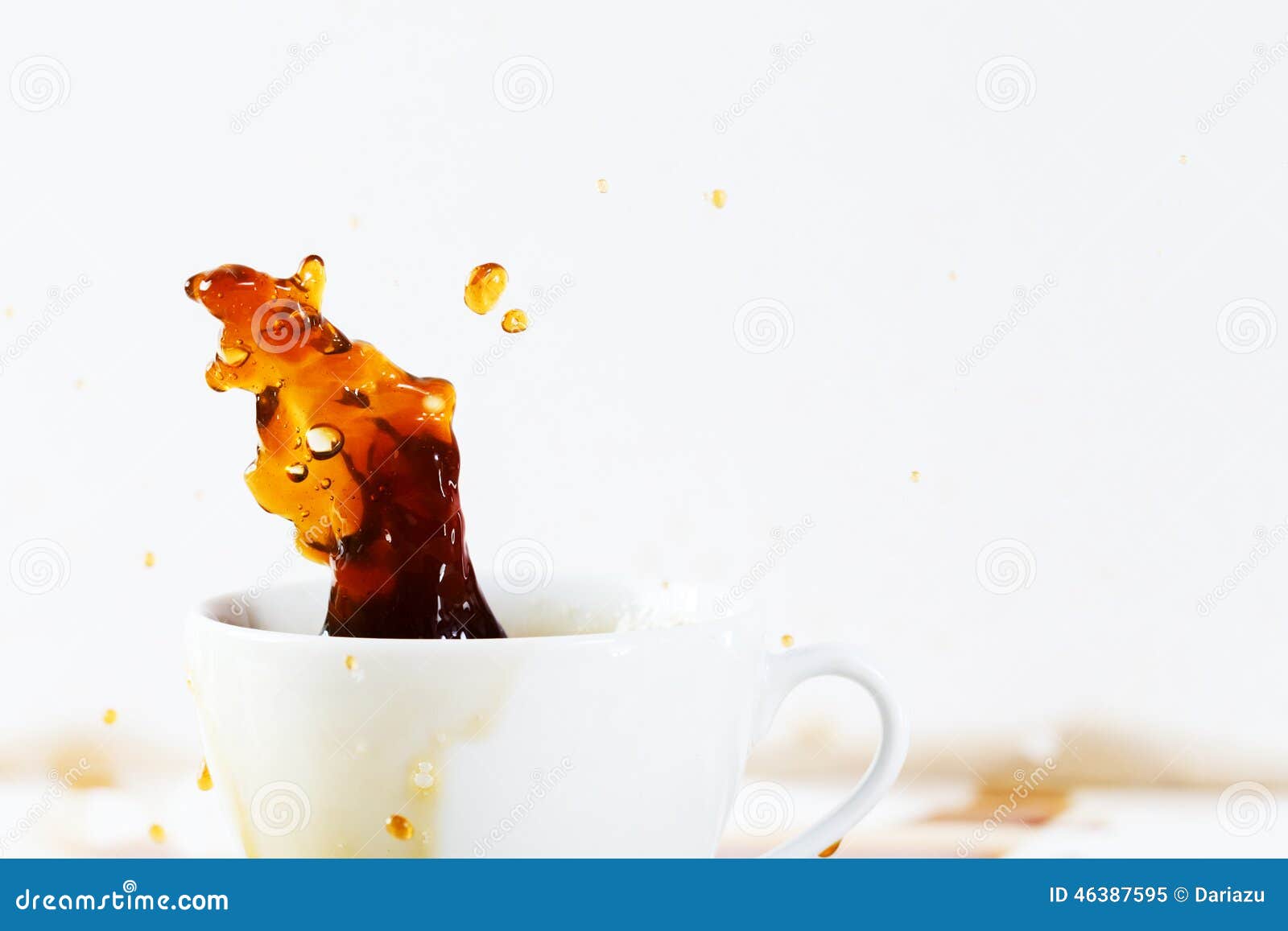 Cup of Spilling Coffee Creating Beautiful Splash Stock Image - Image of ...