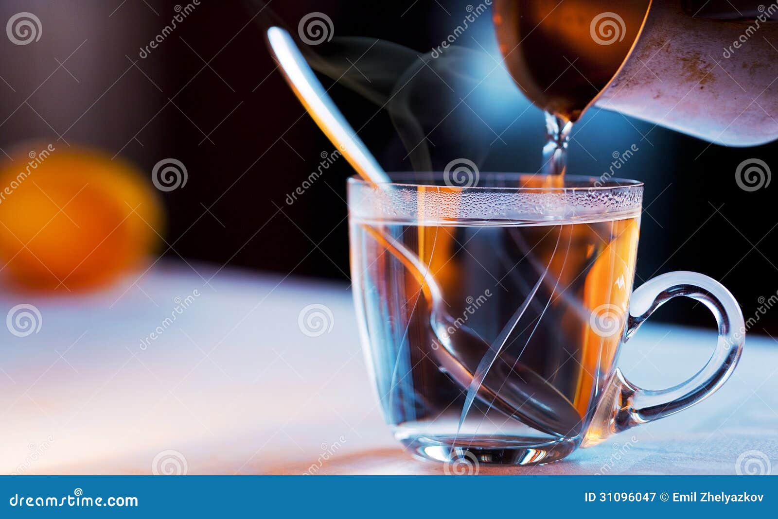 Cup of steaming tea stock image. Image of black, orange - 31096047