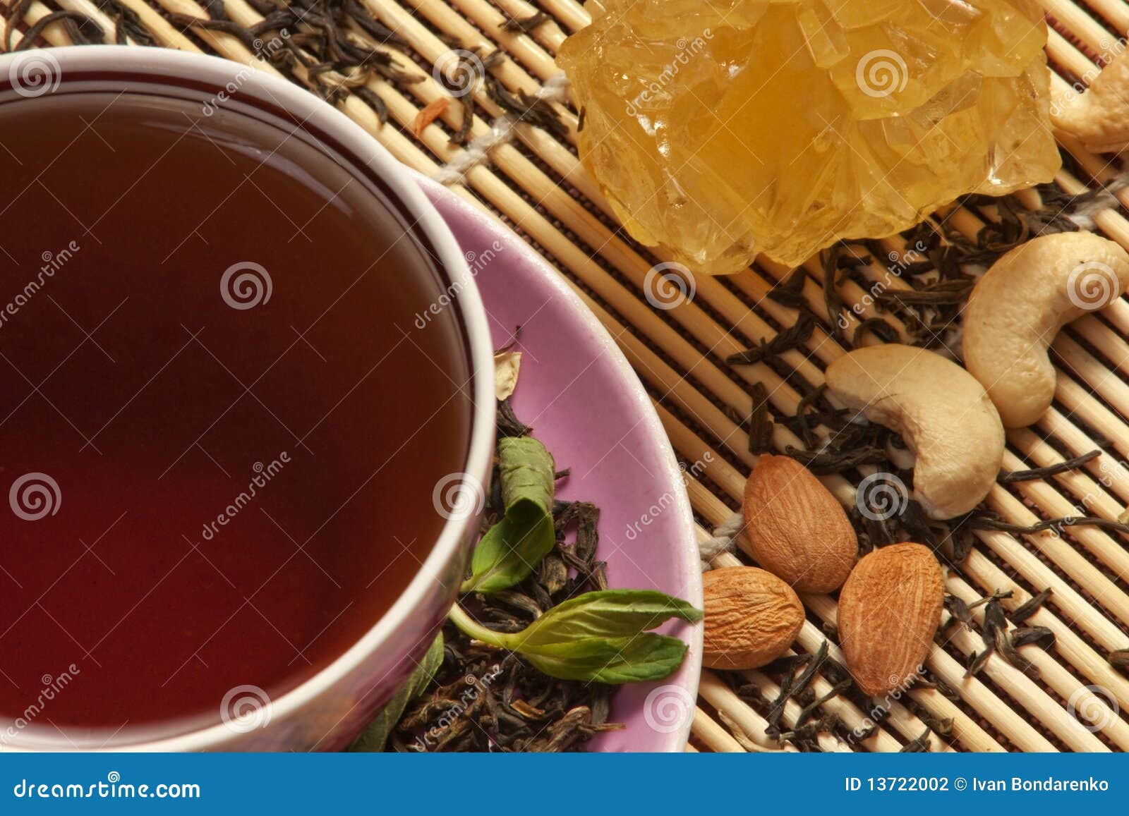 Cup of Tea, Almonds, Nuts and Grape Sugar Stock Photo - Image of close ...