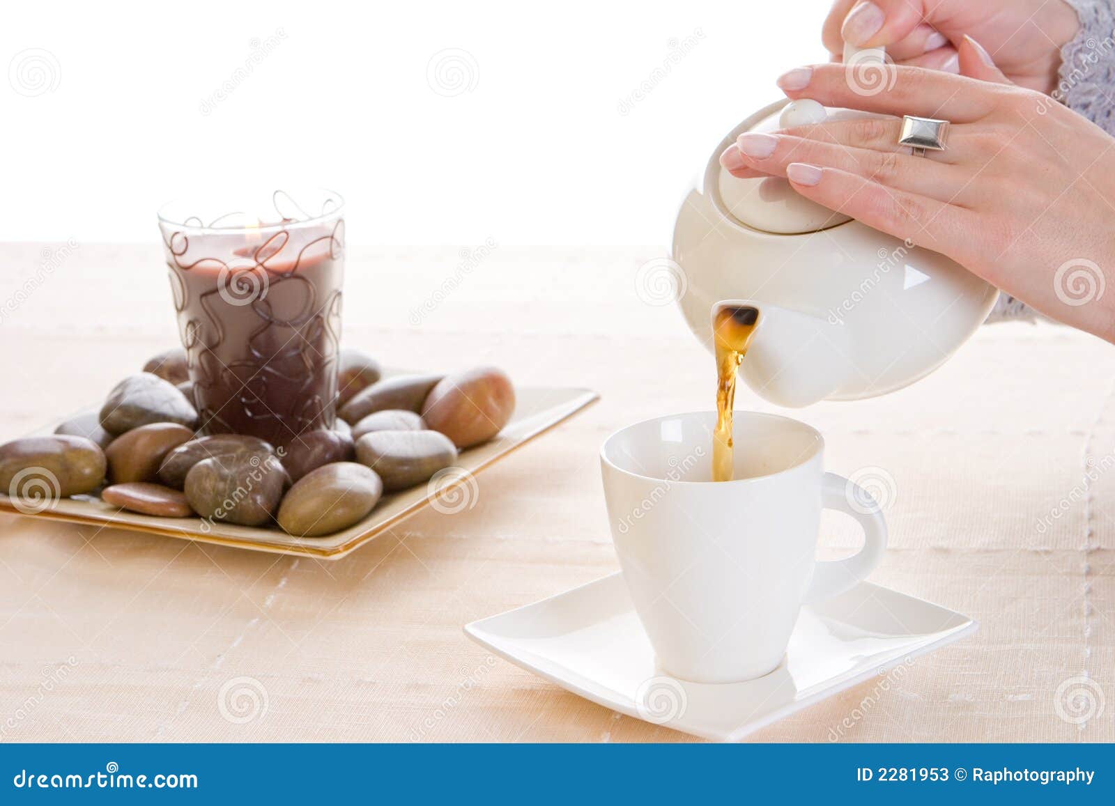A cup of tea being poured stock image. Image of flame - 2281953