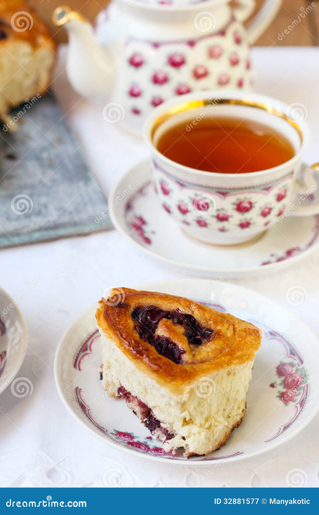 Cup of tea and bun stock image. Image of sweet, roll - 32881577