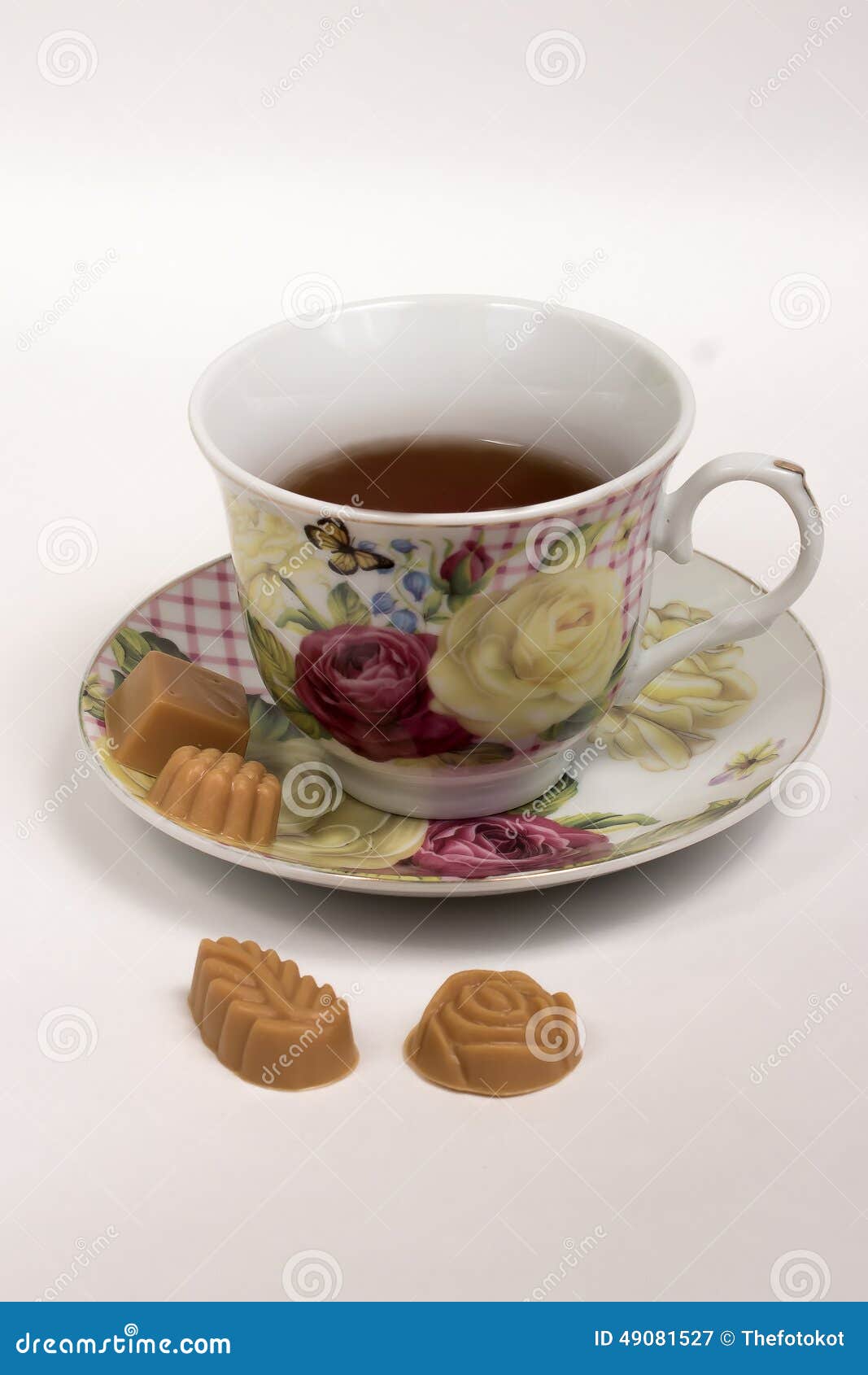 Cup of tea with candies stock image. Image of morning - 49081527