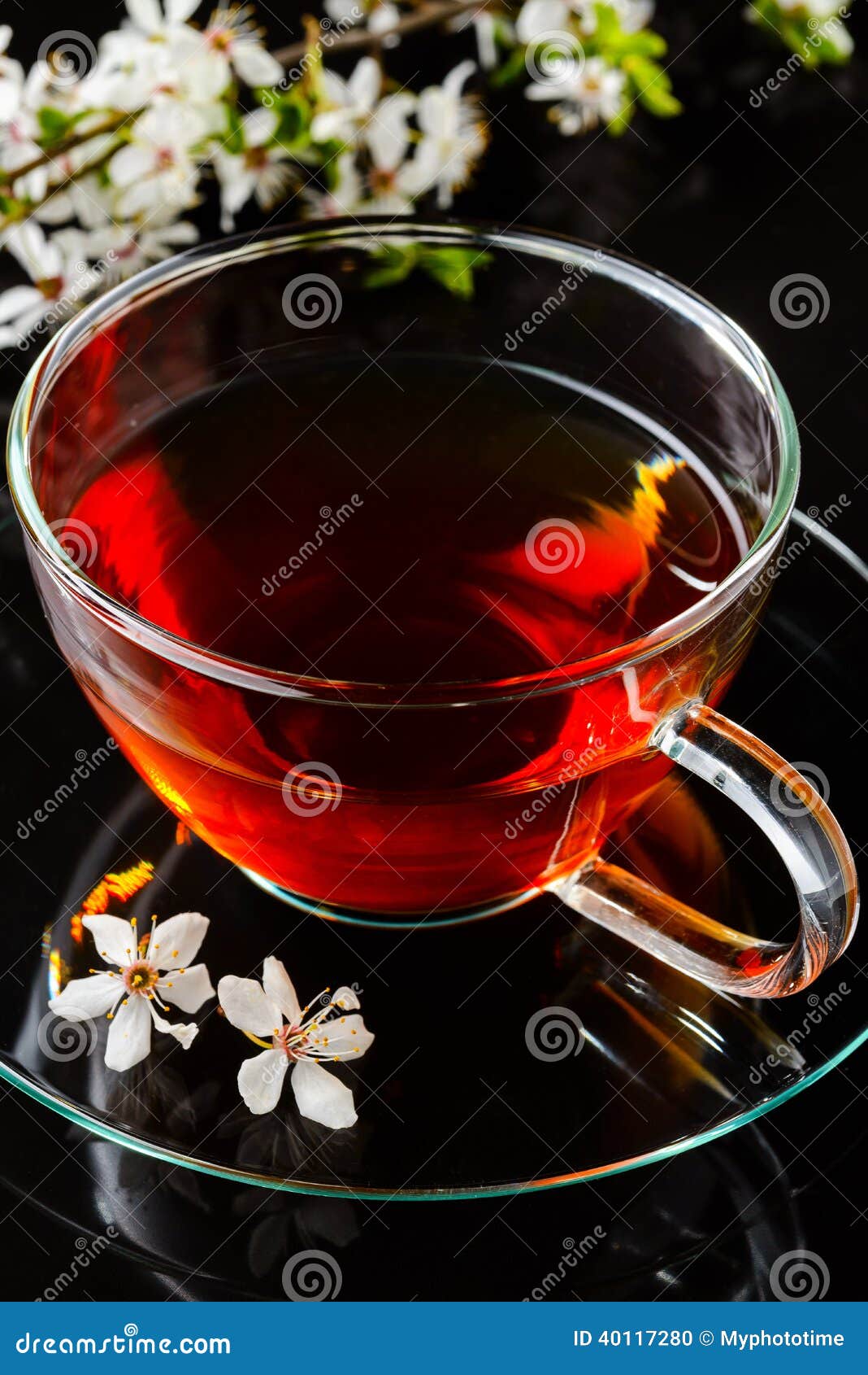 Cup of Tea and Cherry Branch Stock Photo - Image of leaves, bloom: 40117280