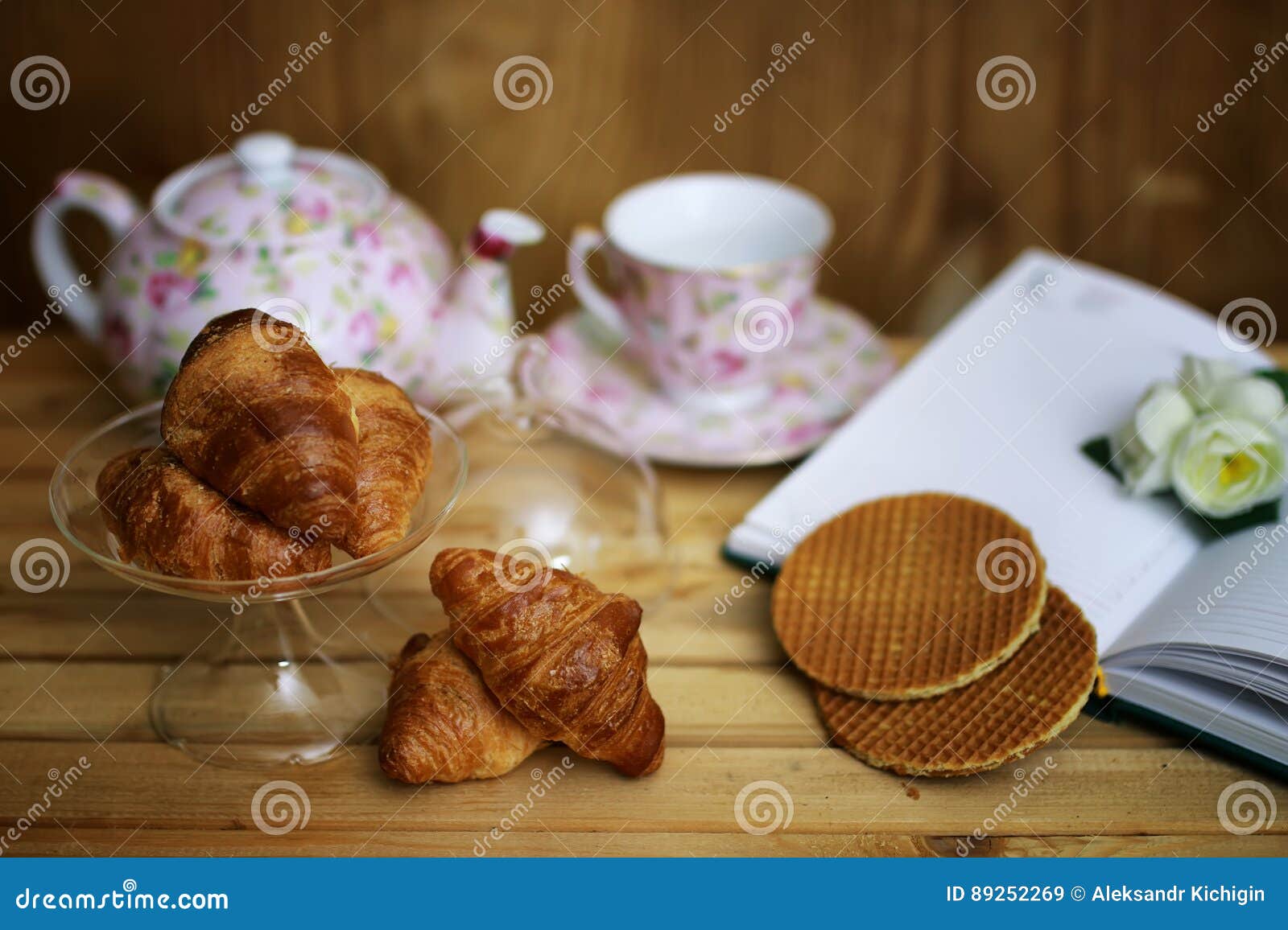Cup with Tea Croissant Book Stock Image - Image of black, french: 89252269