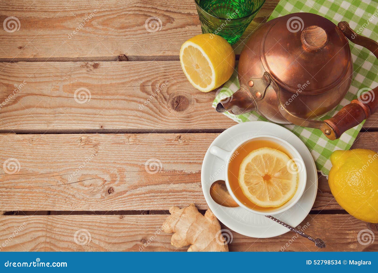 Cup of Tea with Ginger, Lemon and Tea Pot on Wooden Table. View from ...