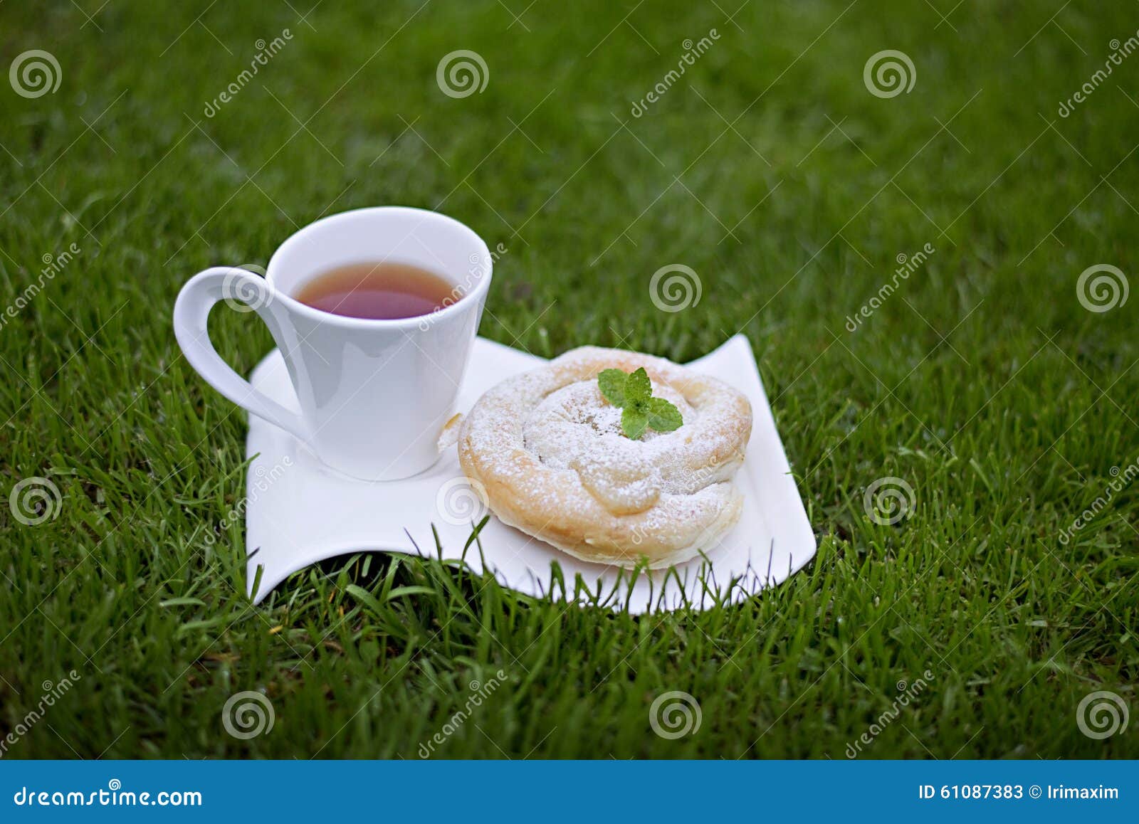 Cup of Tea and Greek Vanilla Swirl Stock Image - Image of table, swirl ...