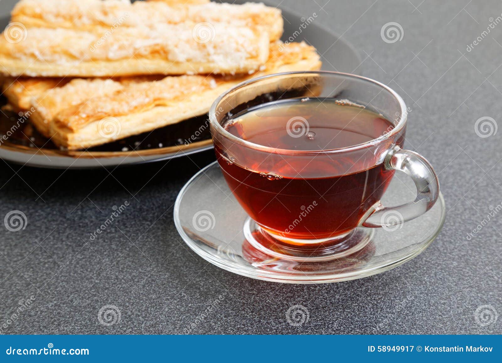 Cup of tea and puff pastry stock image. Image of closeup - 58949917