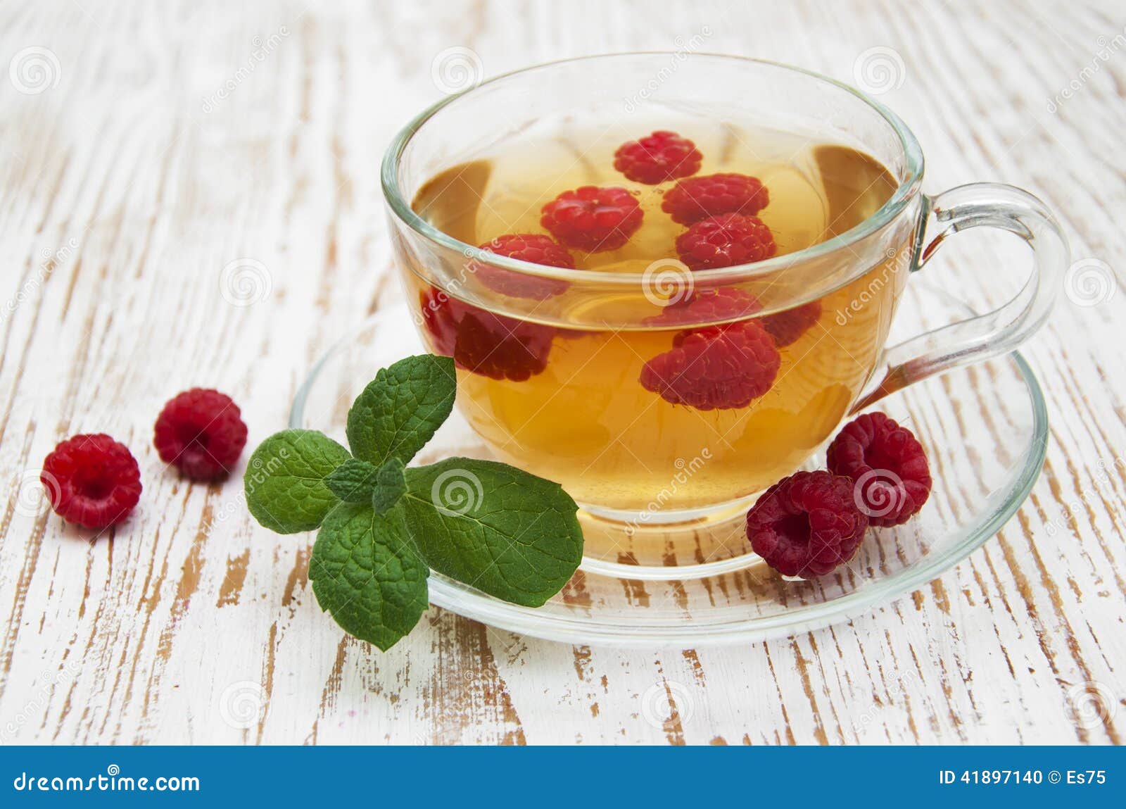 Cup of tea with raspberry stock photo. Image of morning - 41897140