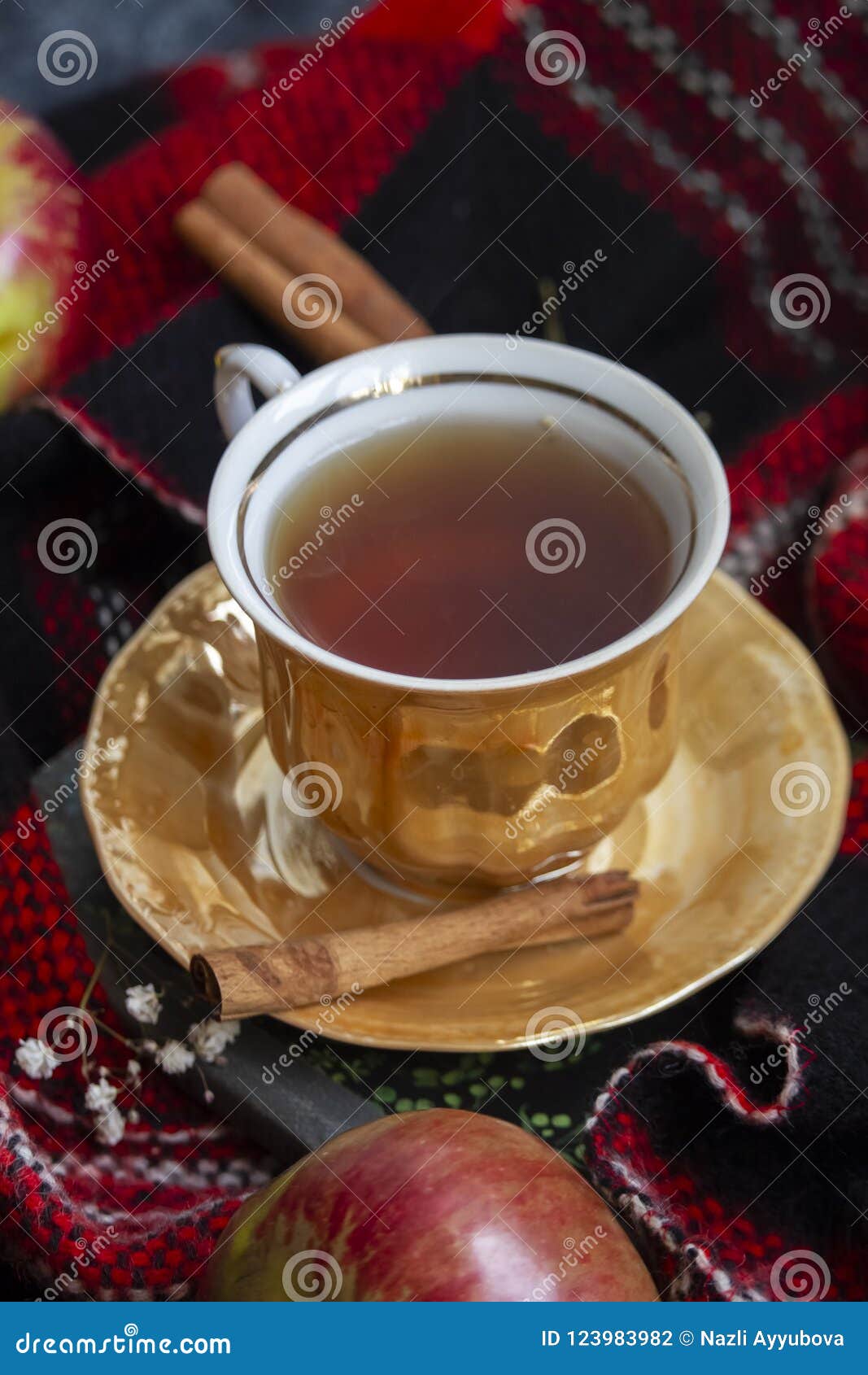 Cup of tea with red apple stock photo. Image of decoration - 123983982