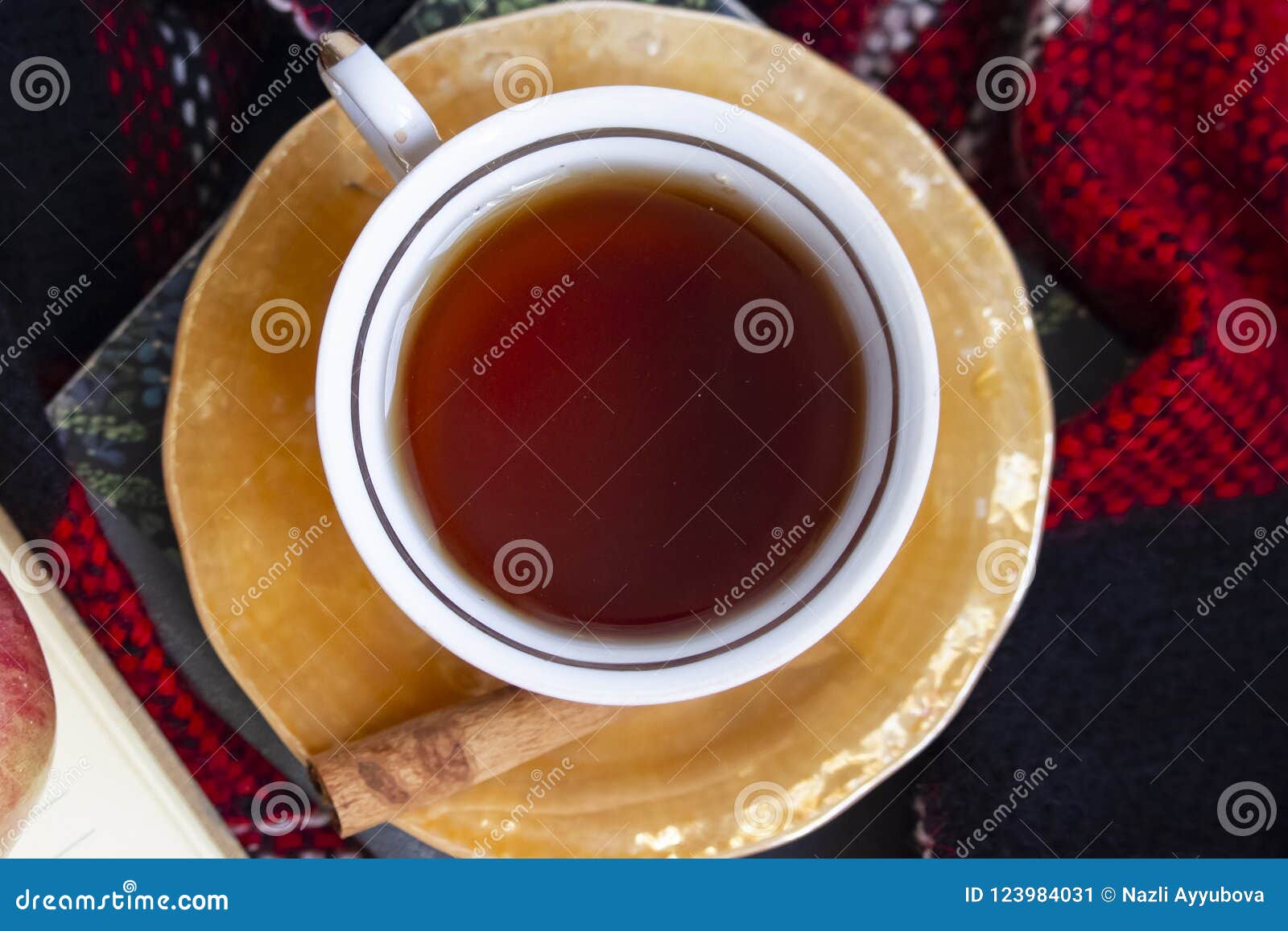 Cup of tea with red apple stock image. Image of flat - 123984031