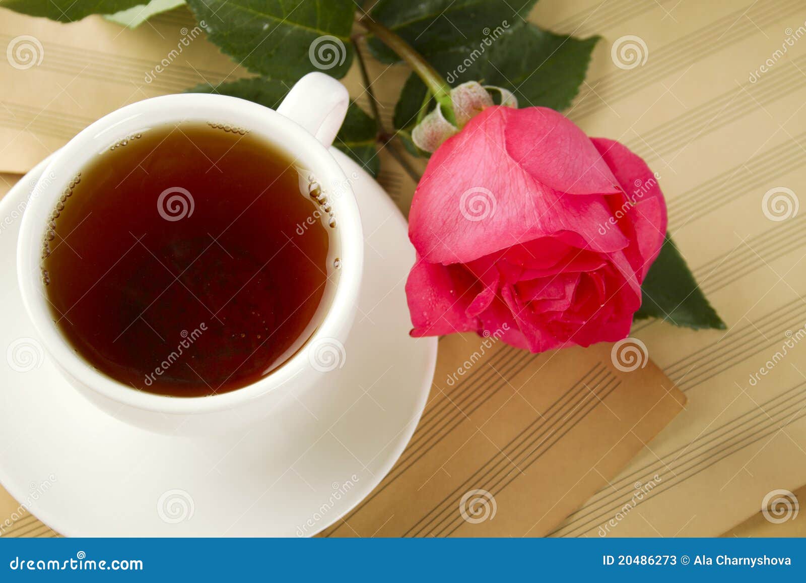 A cup of tea and rose stock image. Image of romance, utensils - 20486273