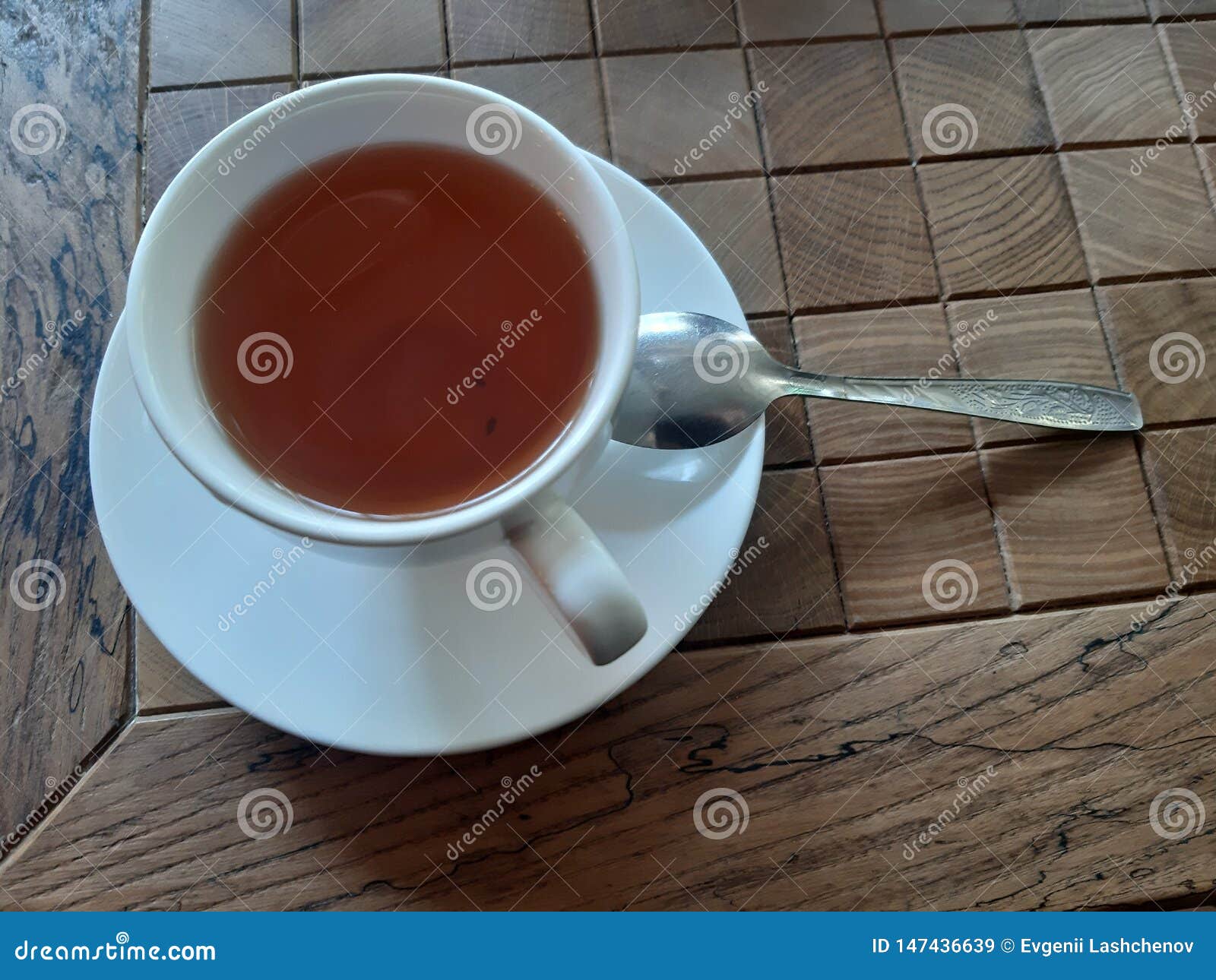 A Cup of Tea with a Spoon on the Table in a Cafe Editorial Stock Image ...