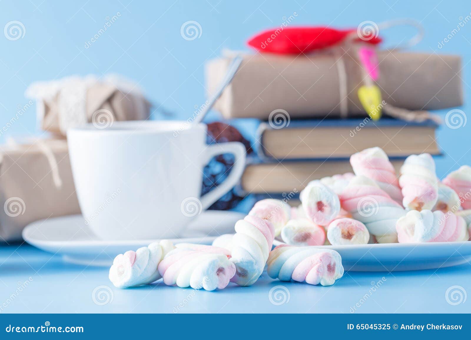 Cup of Tea with Stack of Books with Twisted Marshmallow Stock Image ...