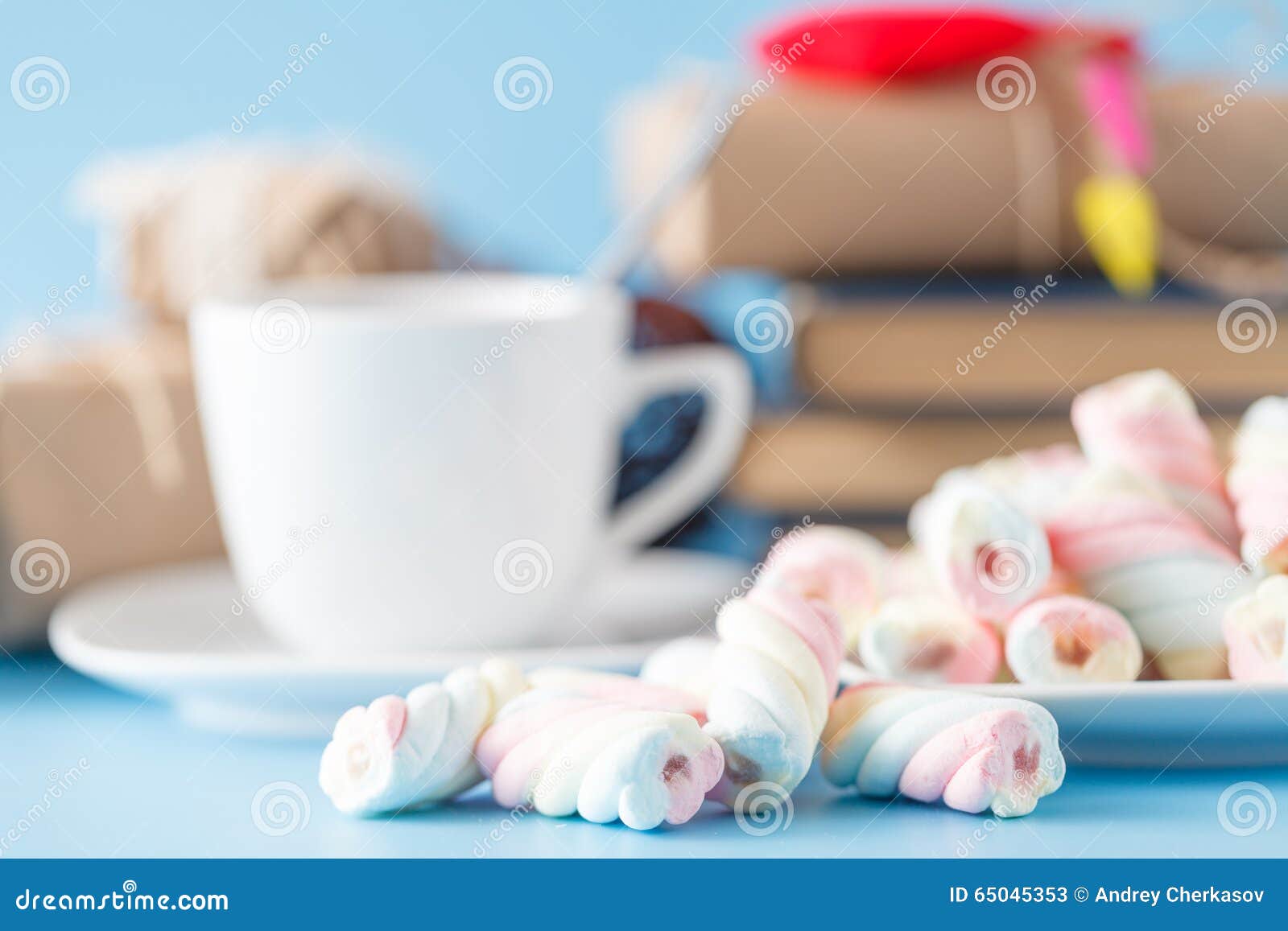 Cup of Tea with Stack of Books with Twisted Marshmallow Stock Image ...