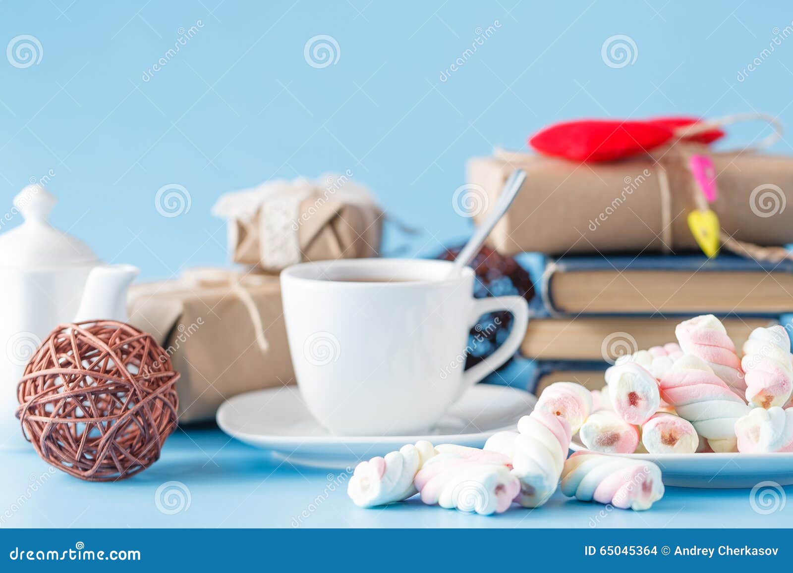 Cup of Tea with Stack of Books with Twisted Marshmallow Stock Photo ...