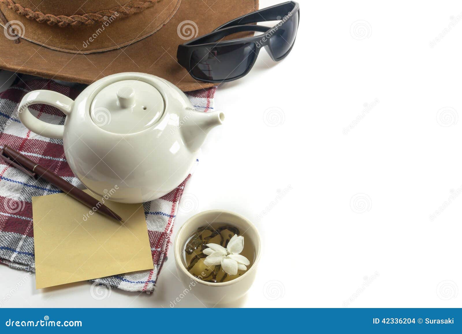 Cup of Tea with Teapot, Hat, Sunglasses, Paper, Pen and Cloth Stock ...