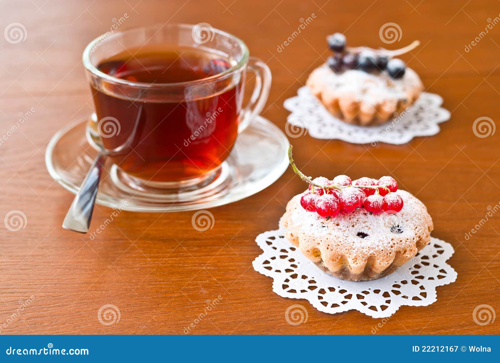 A cup of tea and two cake stock image. Image of paper - 22212167