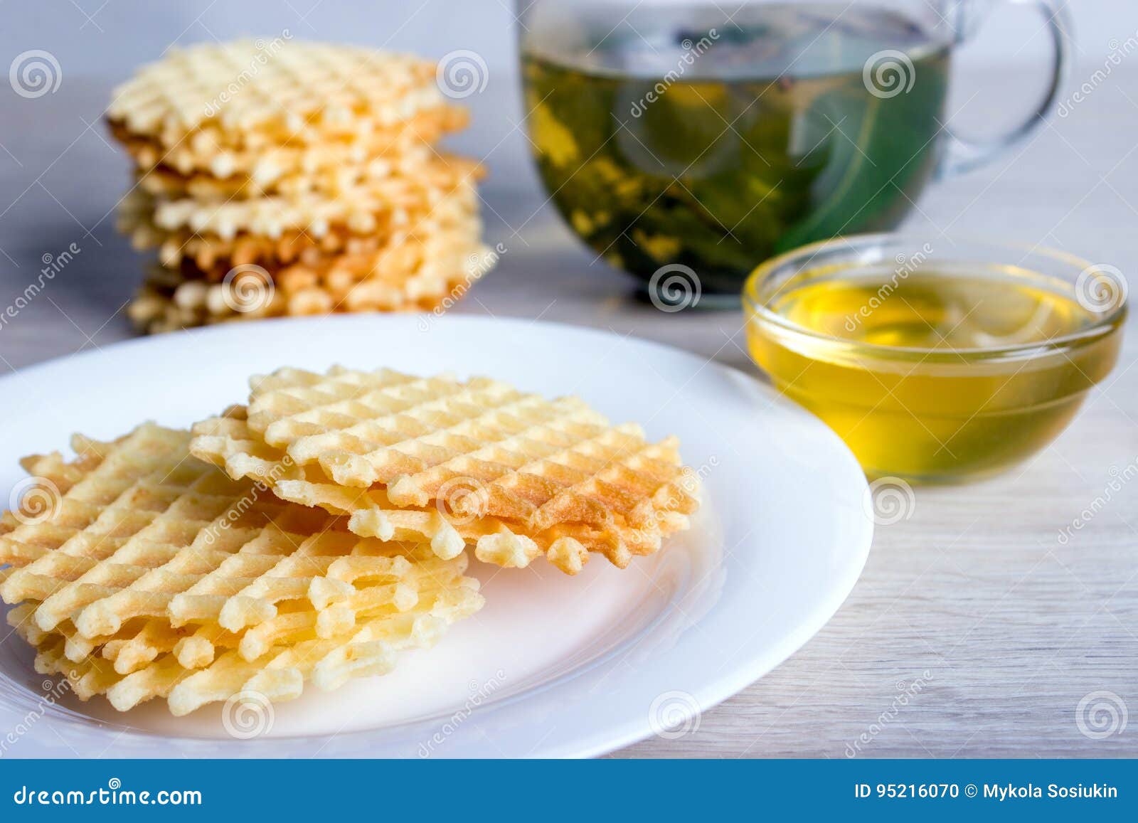 A Cup of Tea with Waffles and Honey Stock Photo - Image of object ...