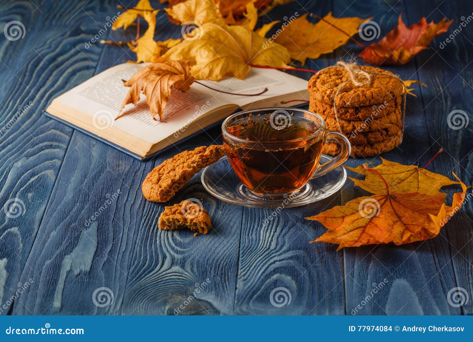 Cup of Tea Wit Old Book and Autumn Leaves on Wooden Table Stock Photo ...