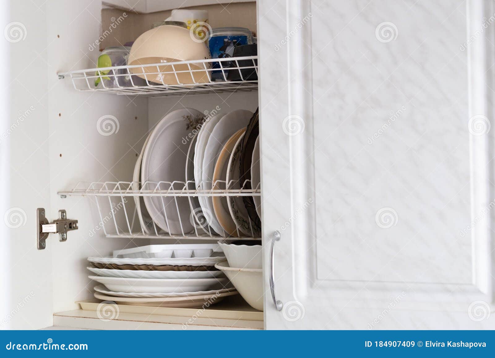 Cupboard with Washed Dishes in the Kitchen Stock Image - Image of ...