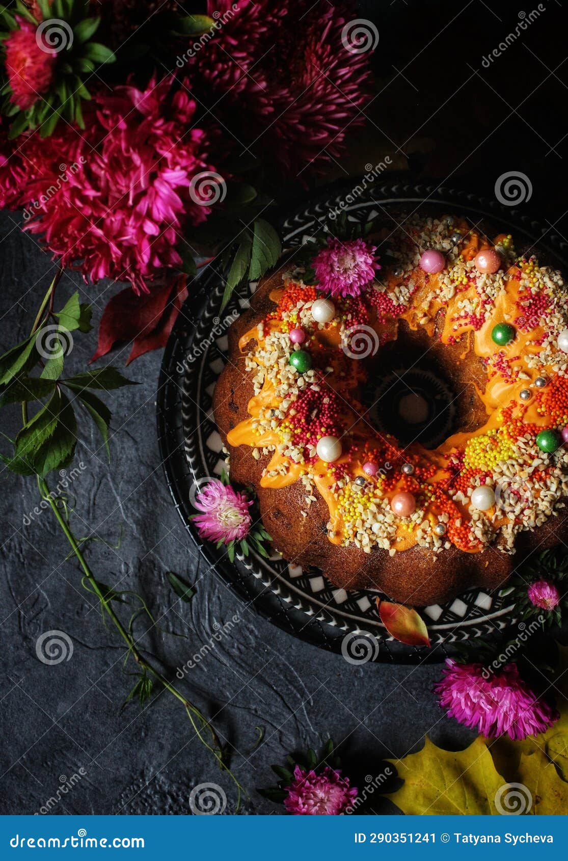 Cupcake and Asters on a Dark Table Background, Delicious Cupcake ...