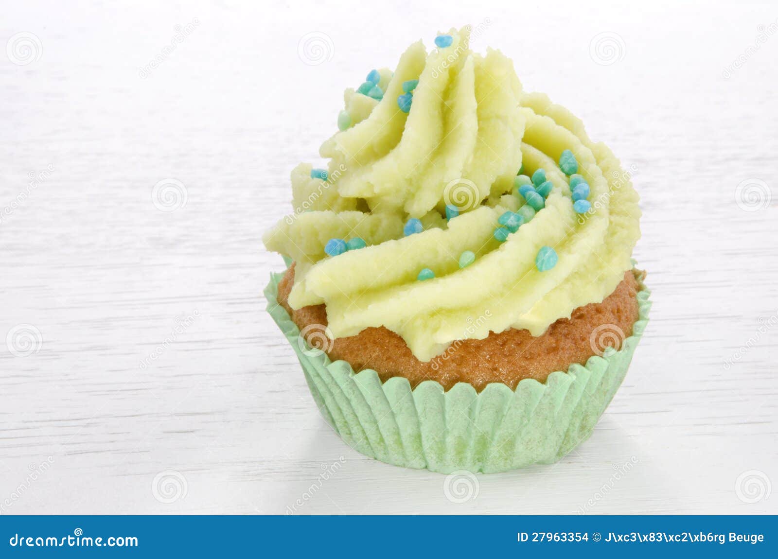 Cupcake with Butter Cream and Turquoise Sprinkles Stock Photo - Image ...