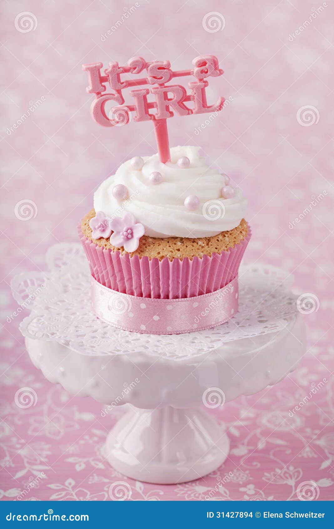 Cupcake with a cake pick stock photo. Image of birthday - 31427894