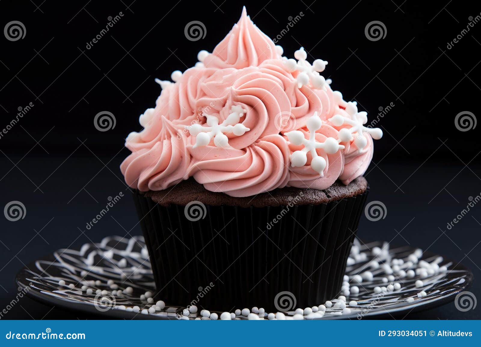 A Cupcake with a Complex Icing Design Set Against a Black Background ...