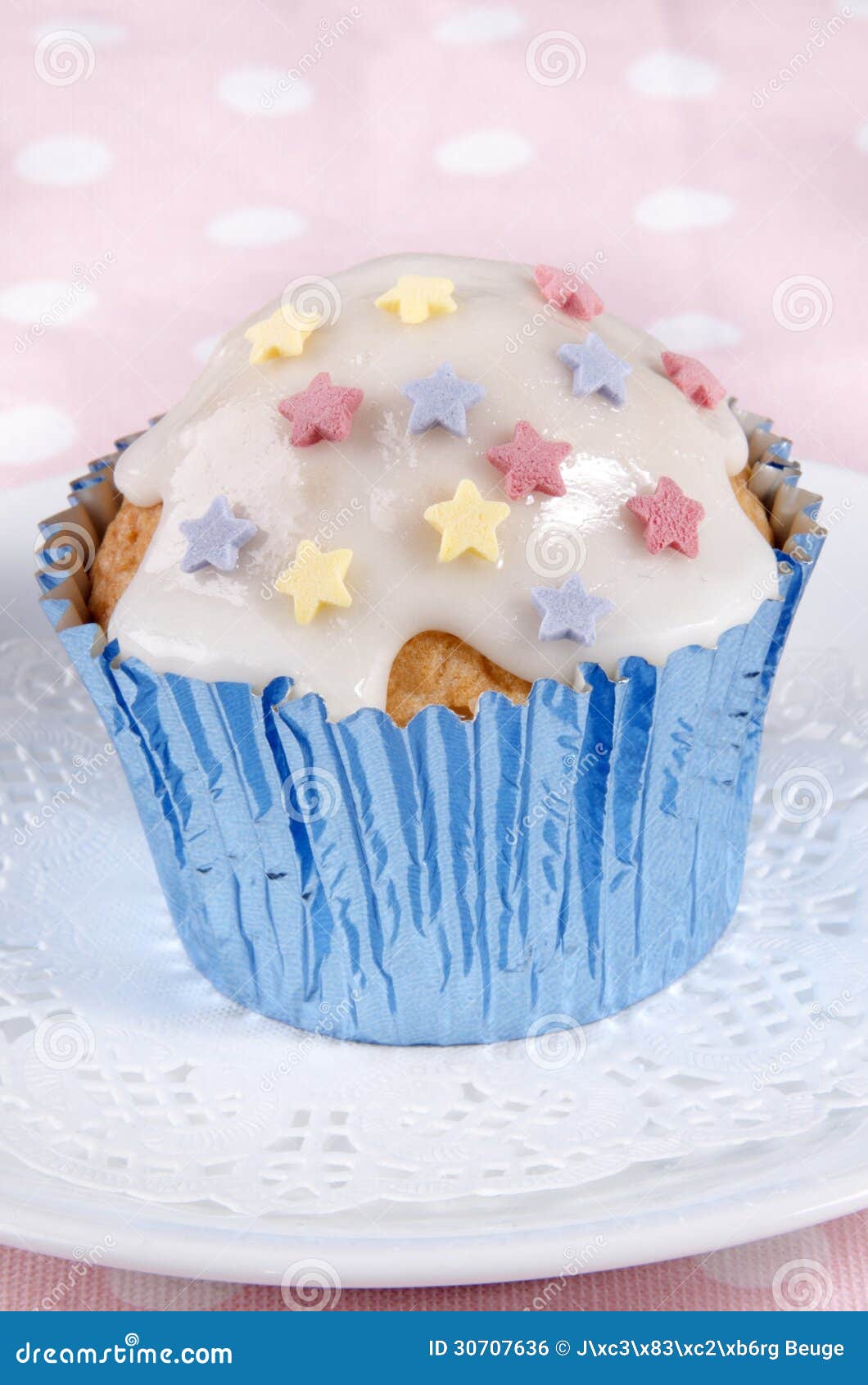 Cupcake with Icing and Colorful Stars Stock Photo - Image of colorful ...