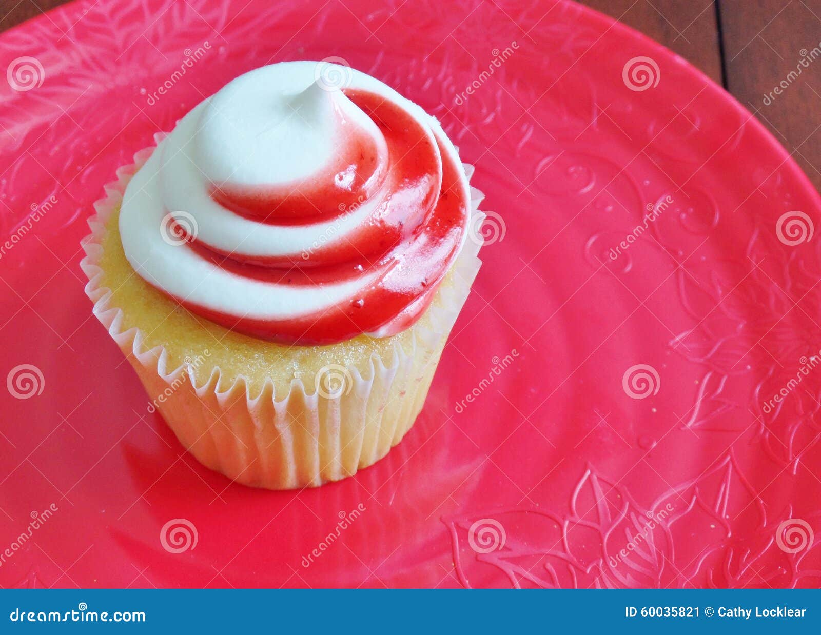 A Cupcake with Red and White Frosting Stock Image - Image of cake ...