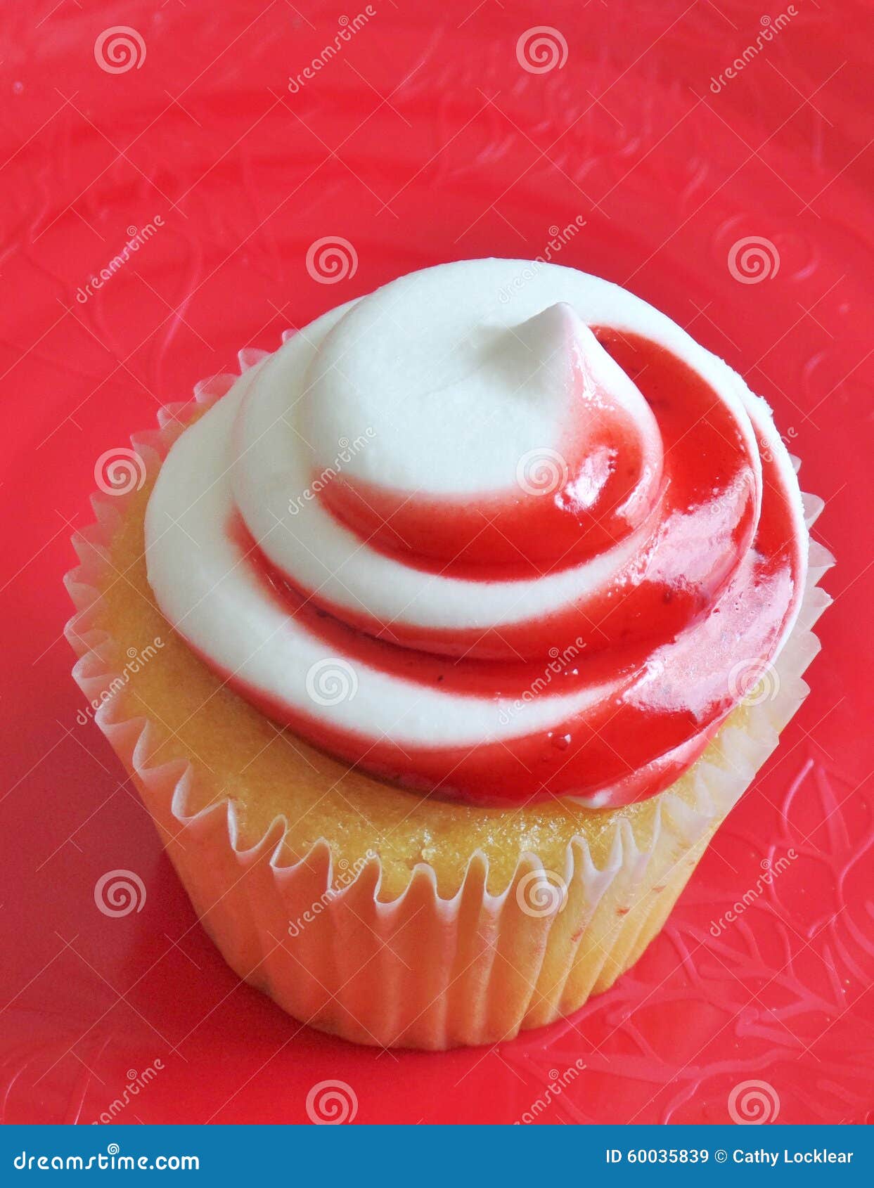 A Cupcake with Red and White Frosting Stock Image - Image of sweet ...