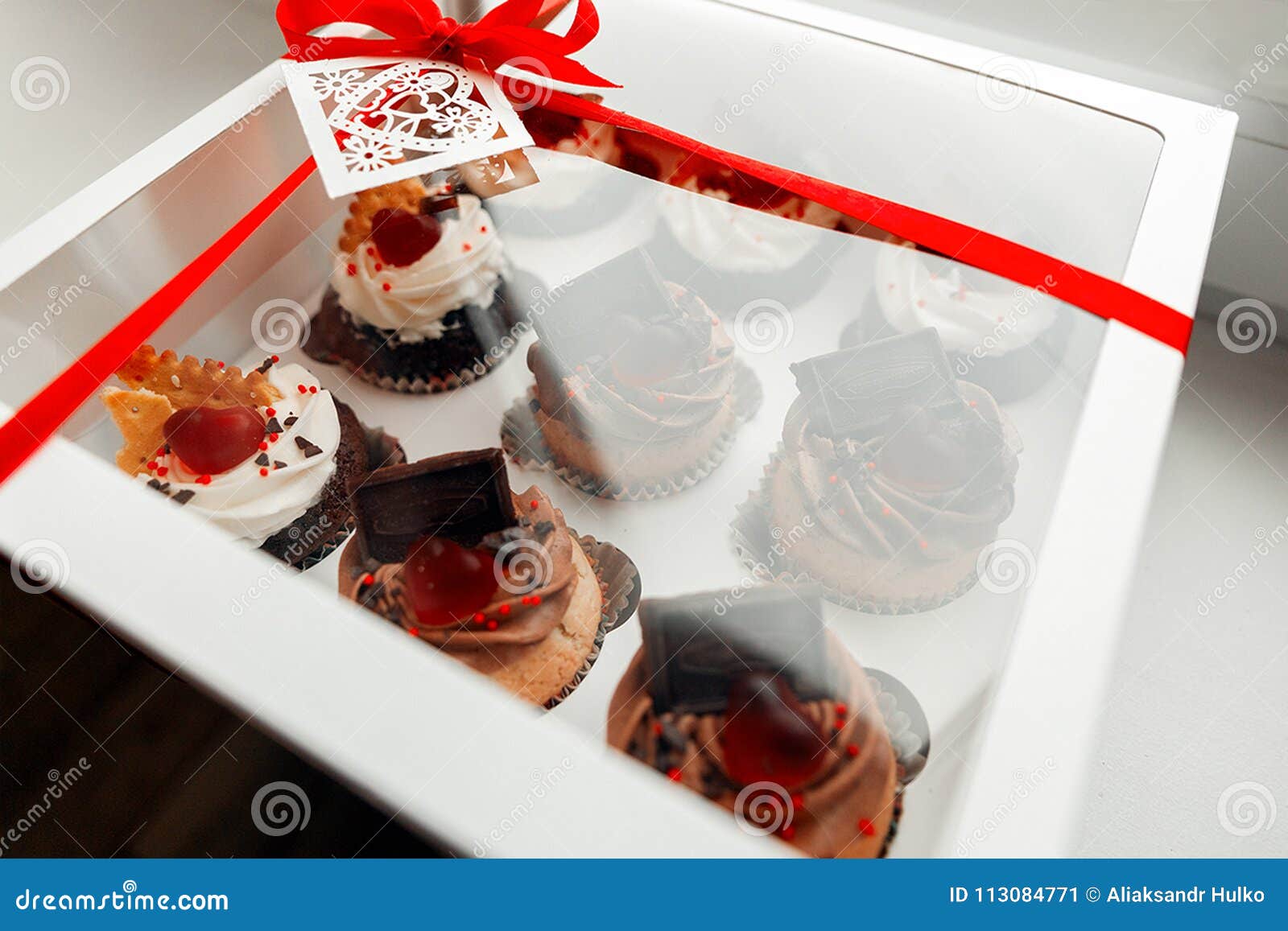 Cupcakes with Cream in the White Box with a Red Ribbon Stock Image ...