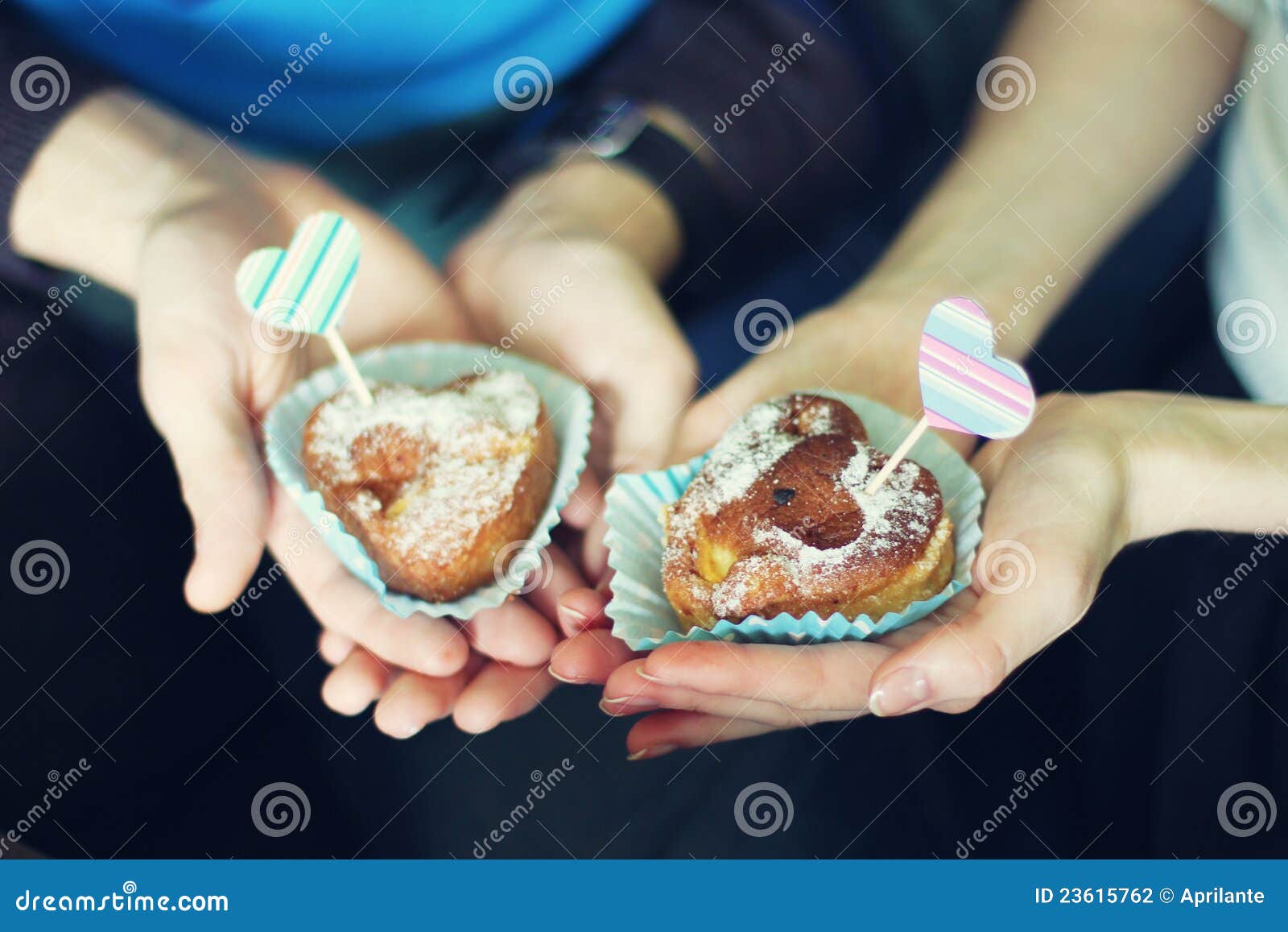 Cupcakes in the hands stock photo. Image of dish, couple - 23615762
