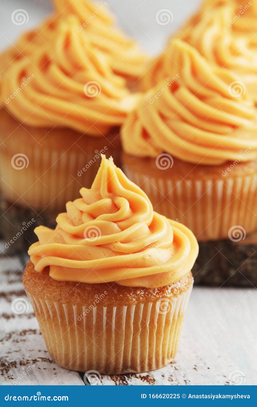 Cupcakes with Orange Icing on Top Stock Image - Image of holiday ...