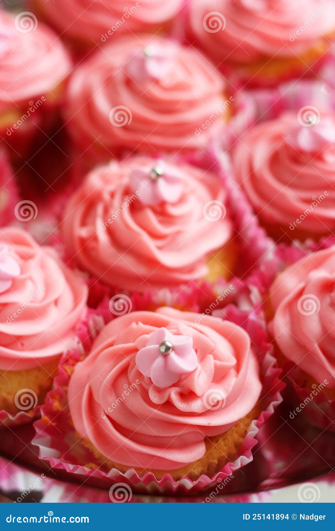 Cupcakes with Pink Fondant Icing Stock Photo - Image of vertical, food ...