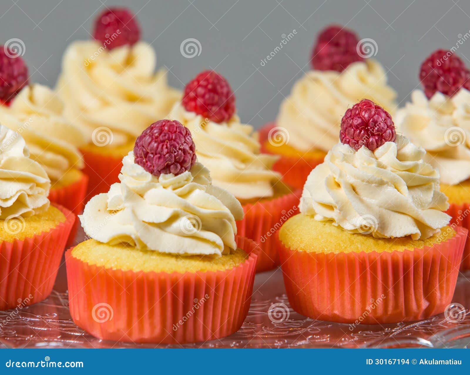 Raspberry Top Cupcakes II stock photo. Image of topping - 30167194
