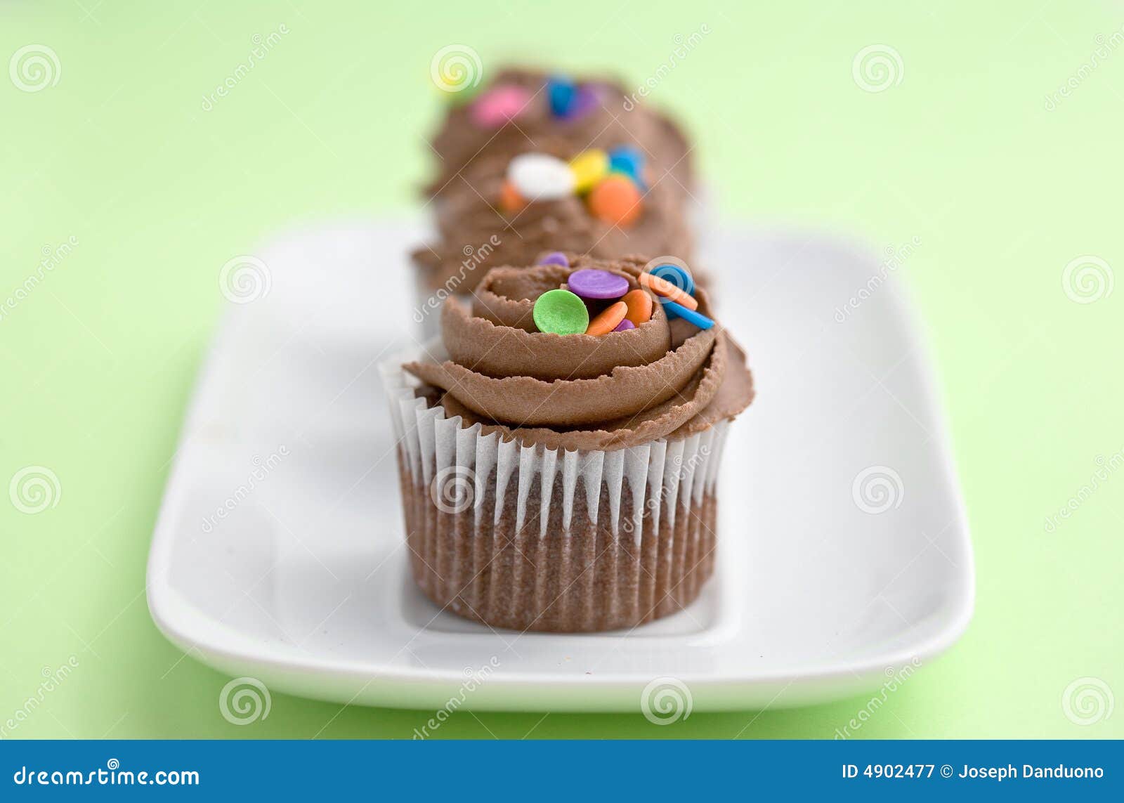 Cupcakes in a row stock image. Image of graduation, sweets - 4902477