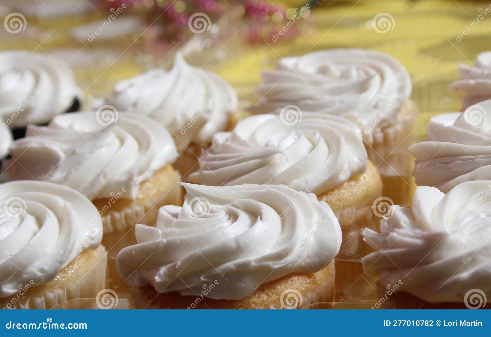 Cupcakes with White Icing on Table at Party or Event Stock Photo ...